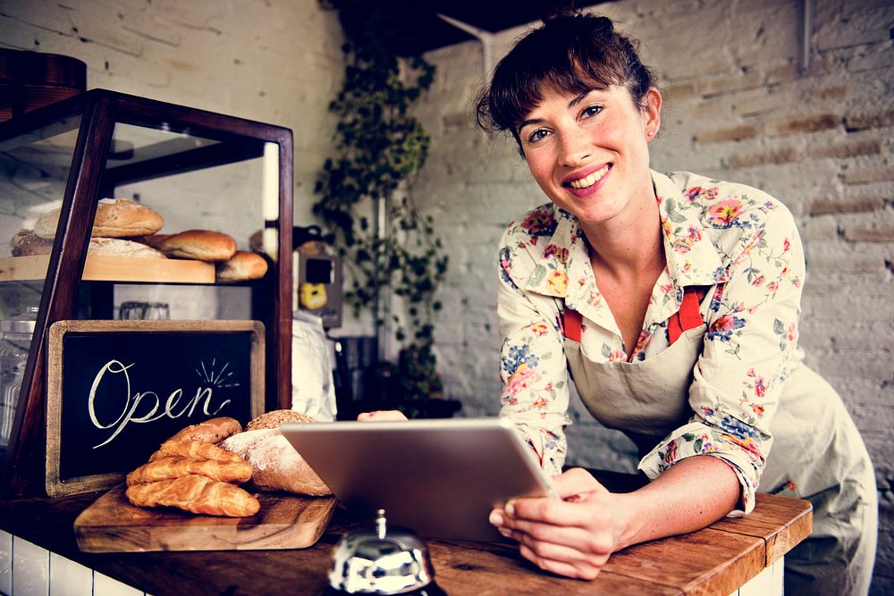 Adult Man Using Tablet in Bakery | Premium Photo - rawpixel