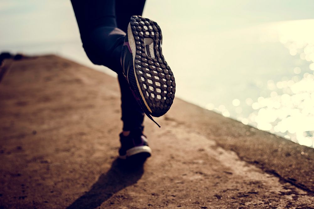 Closeup of shoes while running | Premium Photo - rawpixel
