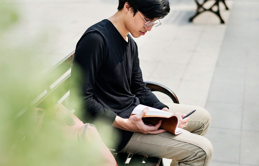 Guy sitting on a bench | Premium Photo - rawpixel