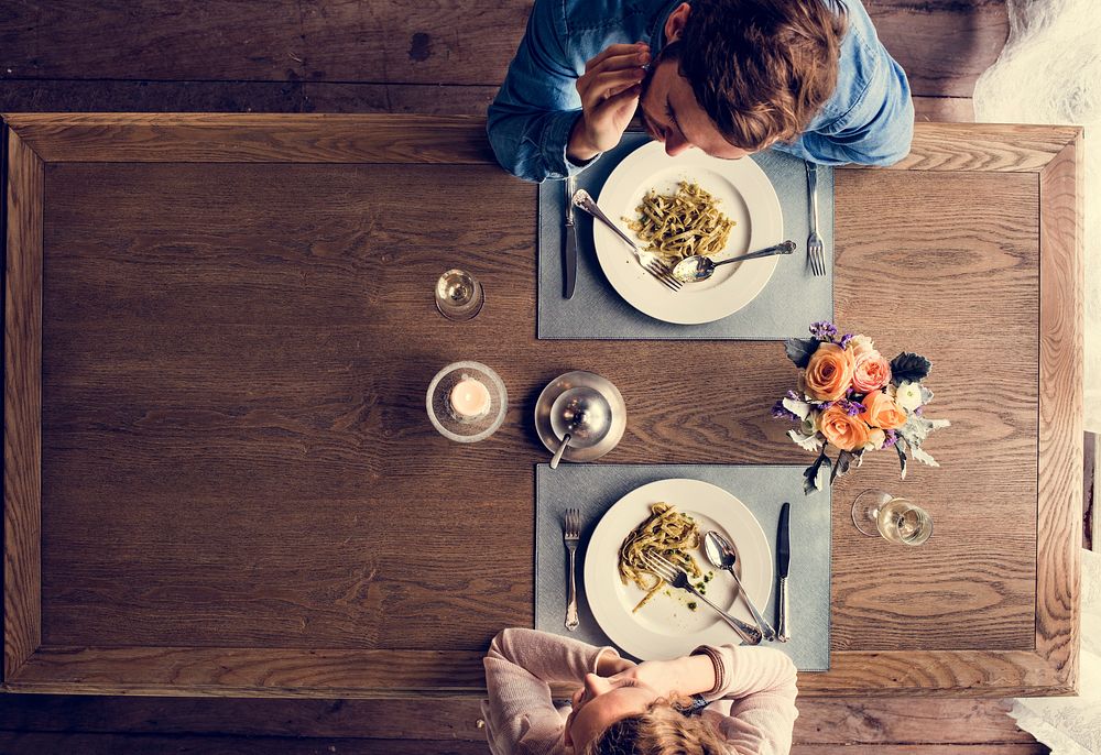 Couple eating dinner together | Premium Photo - rawpixel