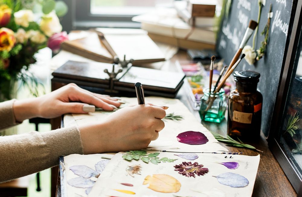 Woman Hand Writing Dry Flowers | Premium Photo - rawpixel