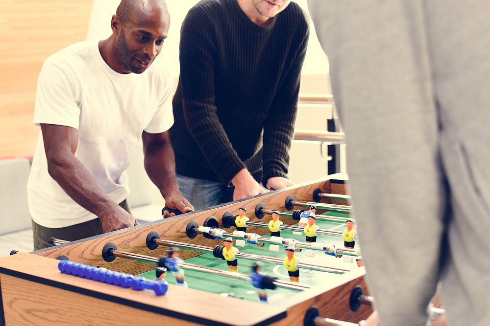 People Playing Enjoying Foosball Table | Premium Photo - rawpixel