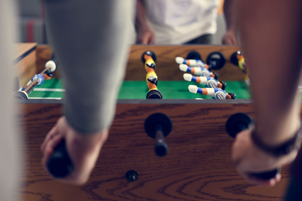 People Playing Enjoying Foosball Table | Premium Photo - rawpixel