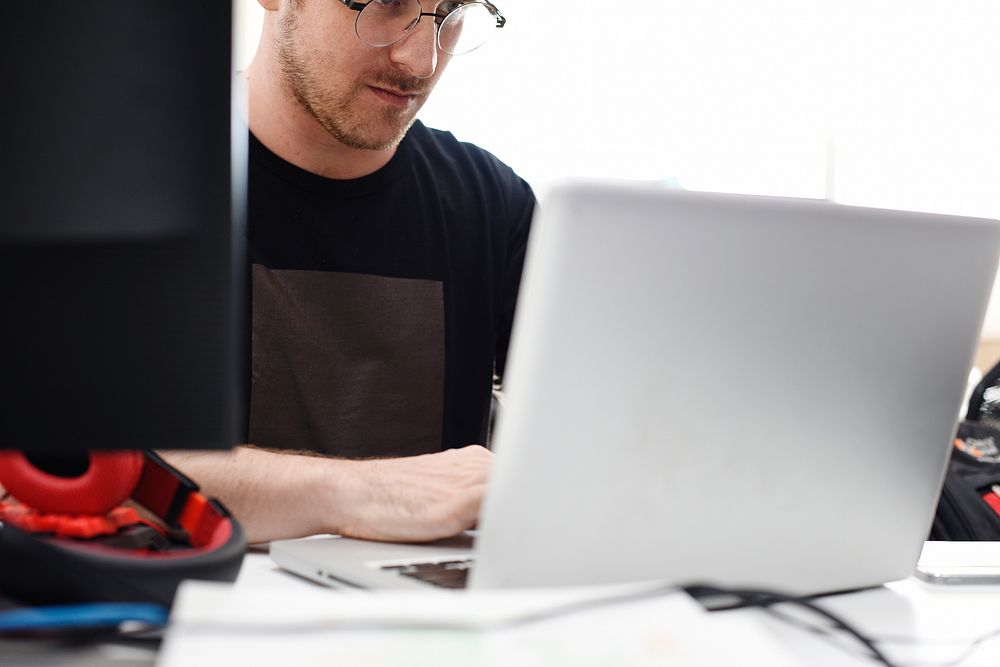 Caucasian man using computer laptop | Premium Photo - rawpixel