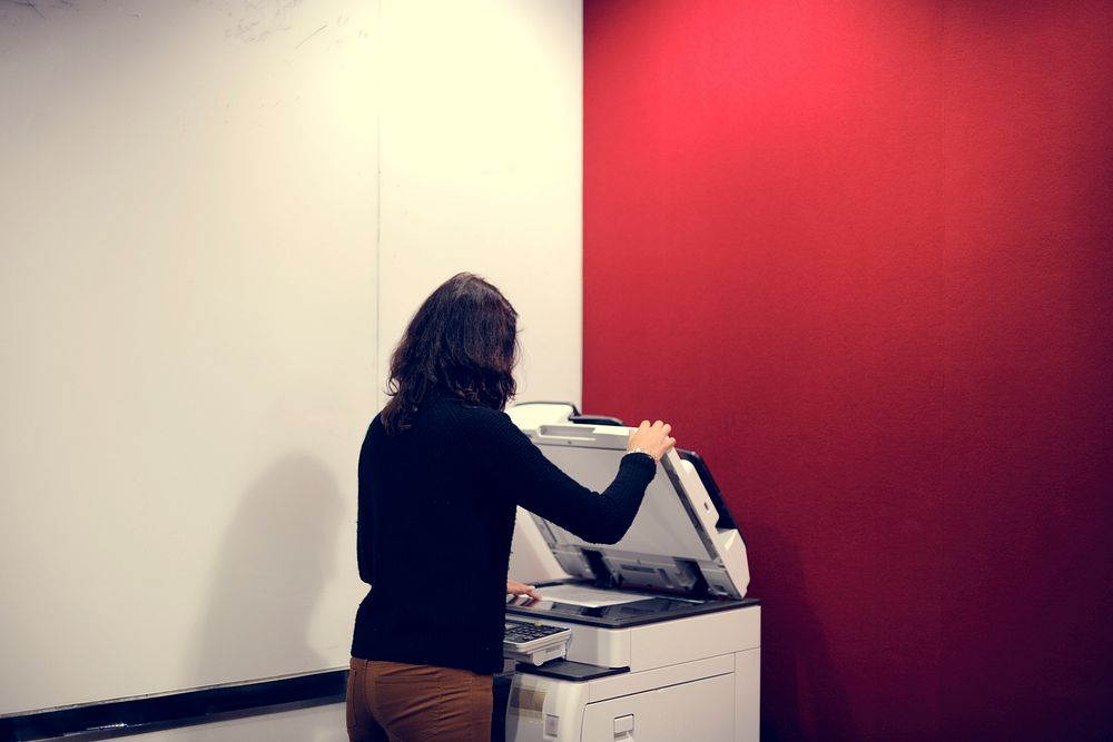 Woman using machine to copy | Premium Photo - rawpixel