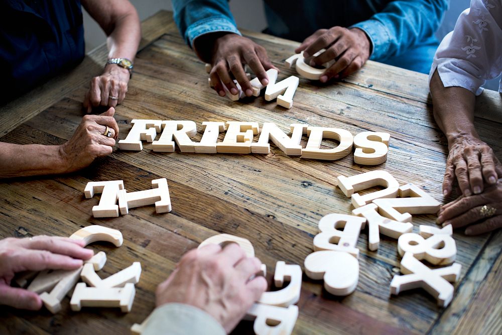 Diverse group spell out friends | Premium Photo - rawpixel