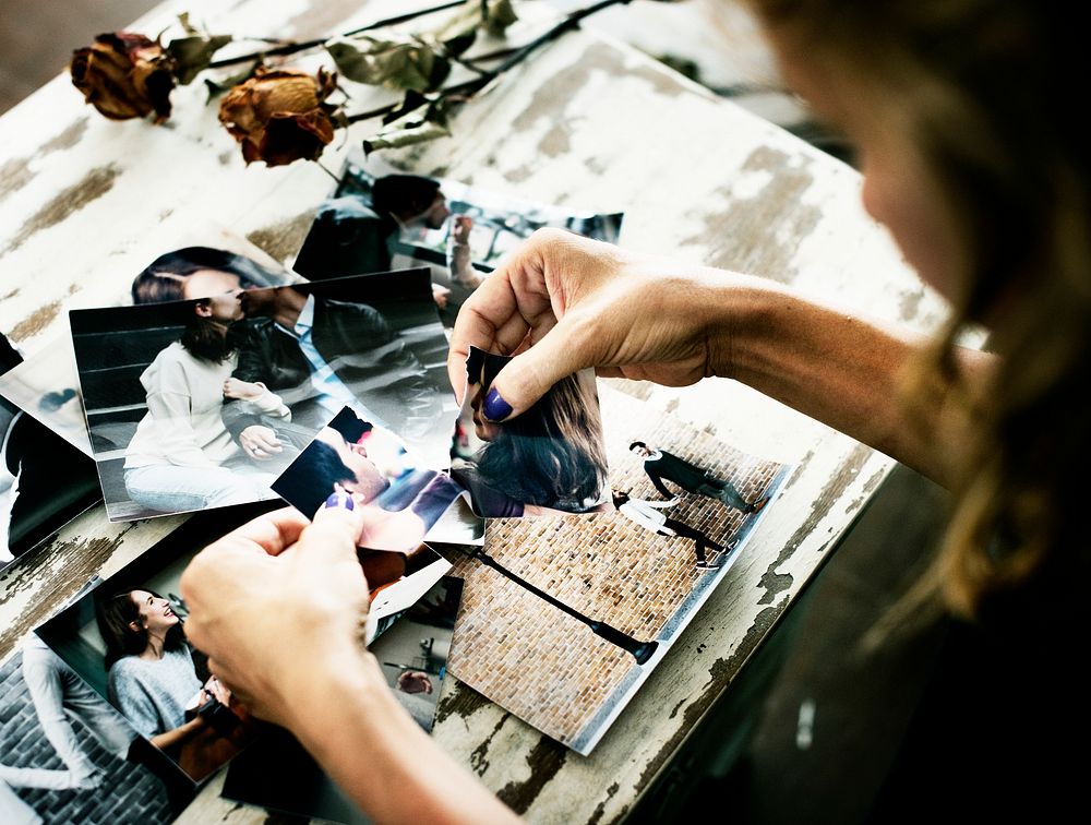 Tearing photos failed relationship | Premium Photo - rawpixel