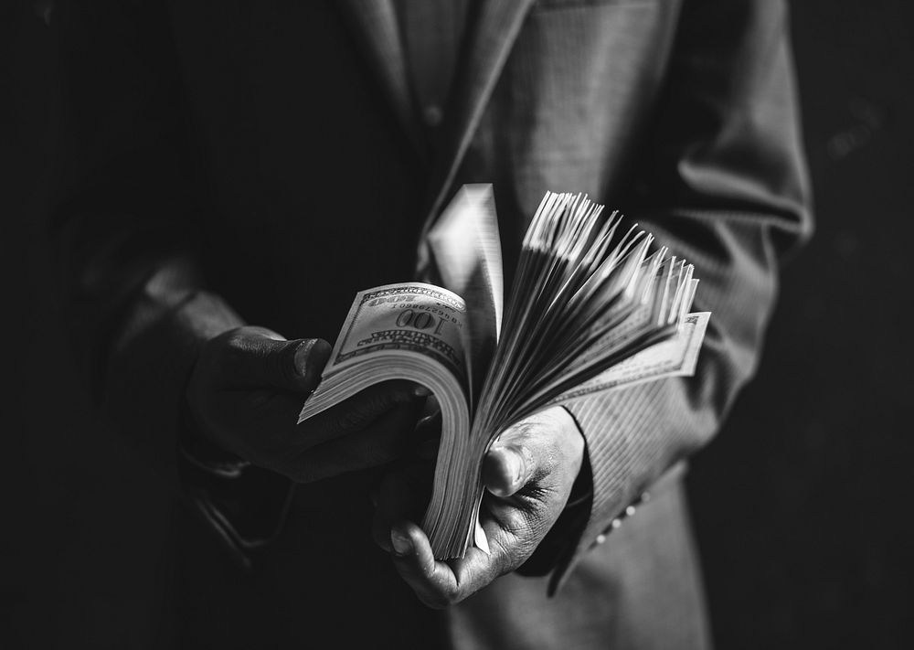 Flipping thick stack cash | Premium Photo - rawpixel