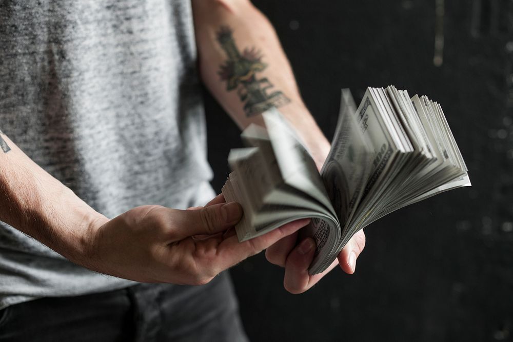 Flipping stack cash | Premium Photo - rawpixel
