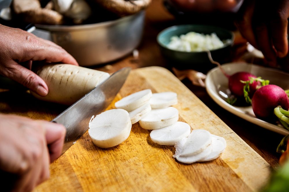 Hands using knife chopping radish | Premium Photo - rawpixel