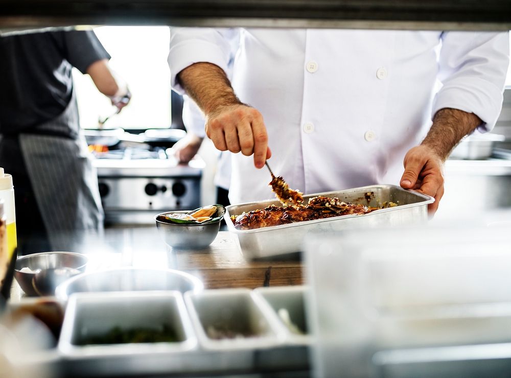 Cooking chef in restaurant kitchen | Premium Photo - rawpixel