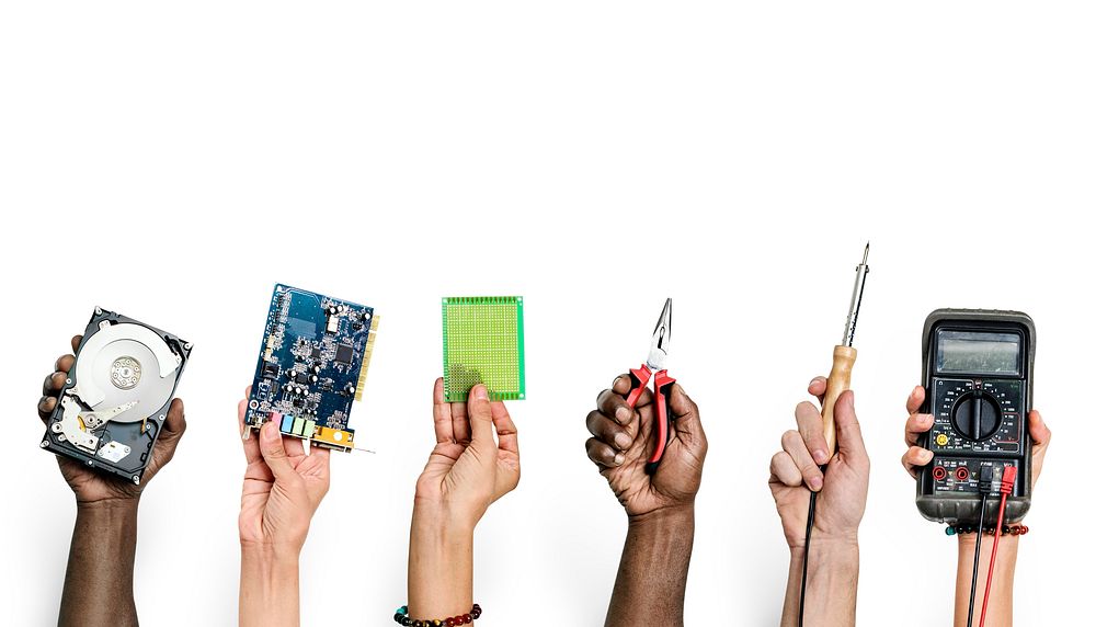 Group of hands holding computer | Photo - rawpixel