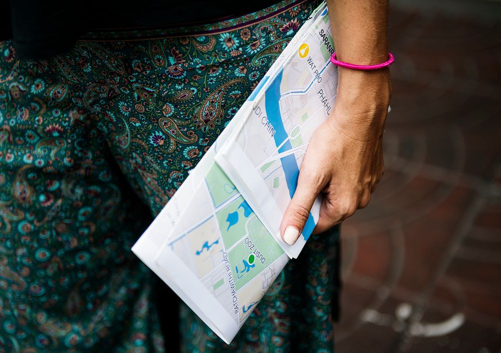 Closeup of hand holding the map | Photo - rawpixel