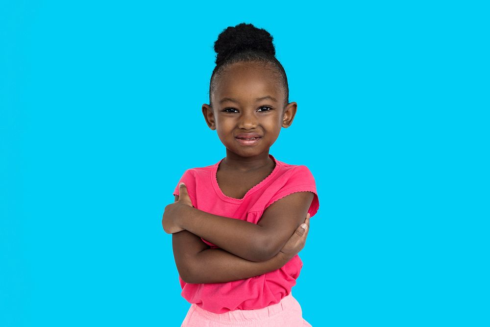 Cute little girl smiling awkwardly | Free Photo - rawpixel