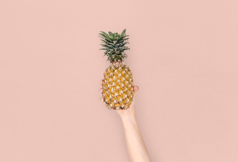 Human Hand Holding Pineapple Fruit | Premium Photo - rawpixel