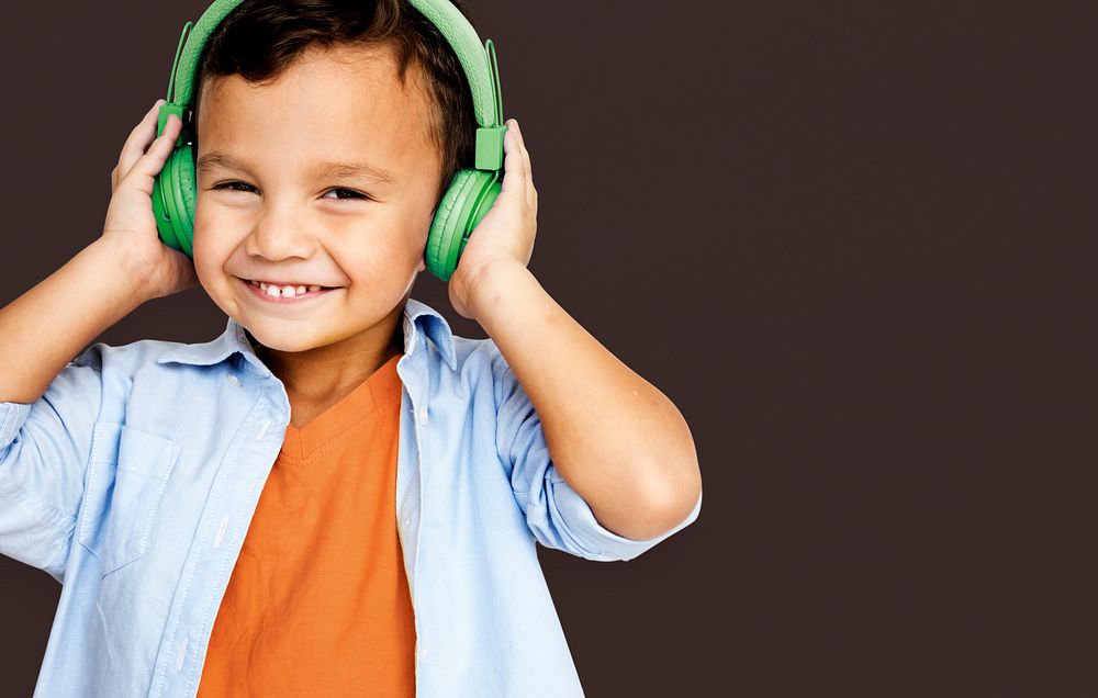 Young asian boy wearing headphones | Premium Photo - rawpixel
