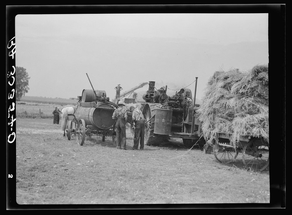 Threshing machinery and crew Kewanee, | Free Photo - rawpixel