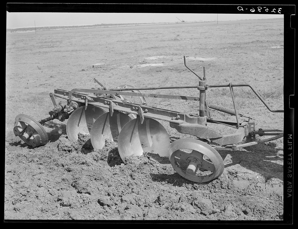 Disk plow drawn tractor breaking | Free Photo - rawpixel