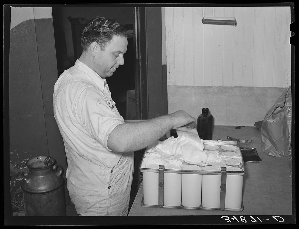 Scraping surplus ice cream mix | Free Photo - rawpixel