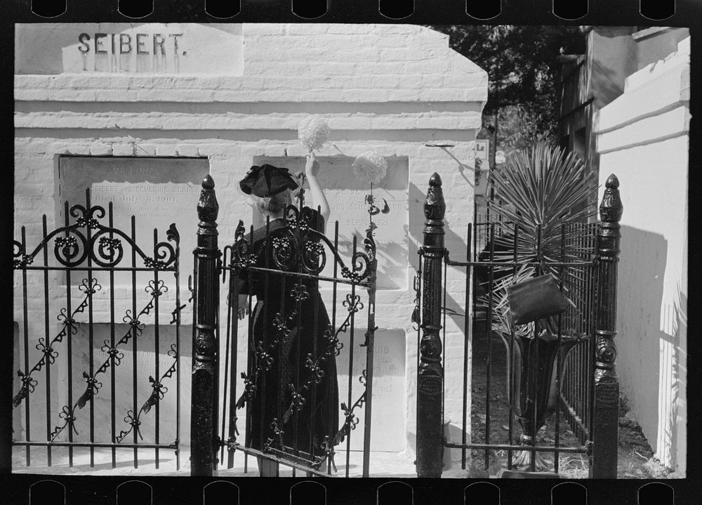 Woman decorating family burial vaults | Free Photo - rawpixel