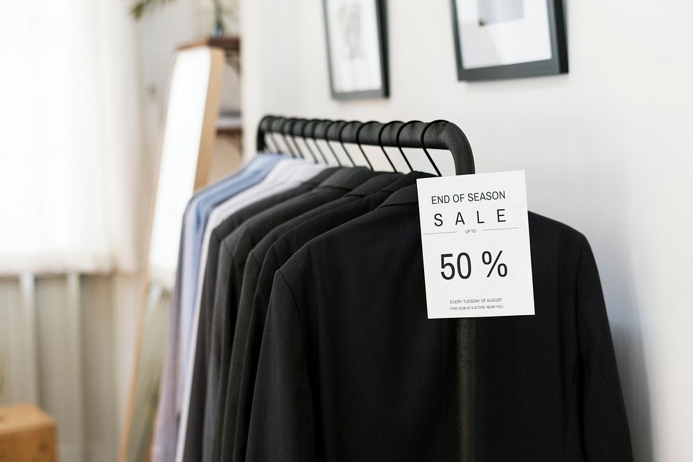 hanging clothes sale sign | Premium Photo - rawpixel