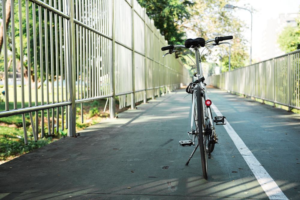 White bike parking on a street | Premium Photo - rawpixel