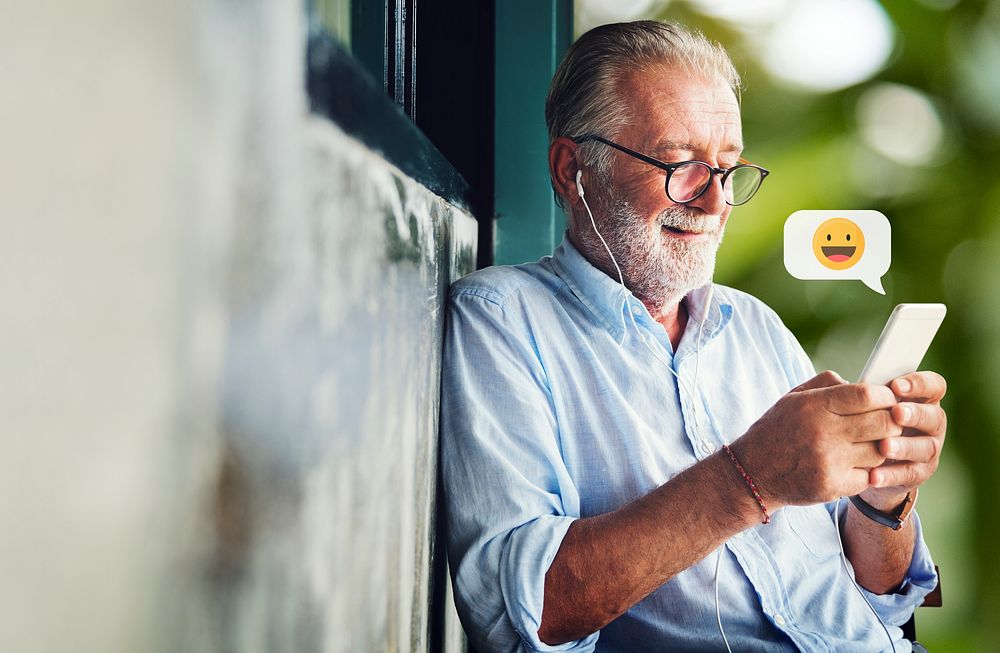 Elderly man texting his smartphone | Premium Photo - rawpixel
