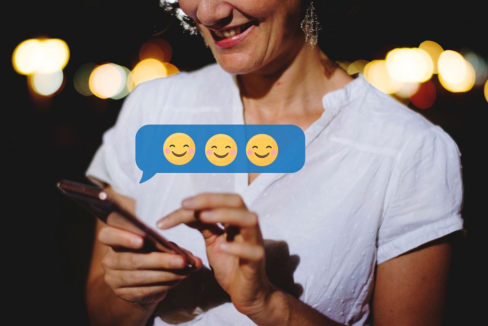 Happy woman texting at night | Premium Photo - rawpixel