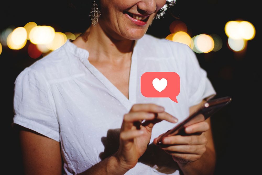 Happy woman texting at night | Premium Photo - rawpixel