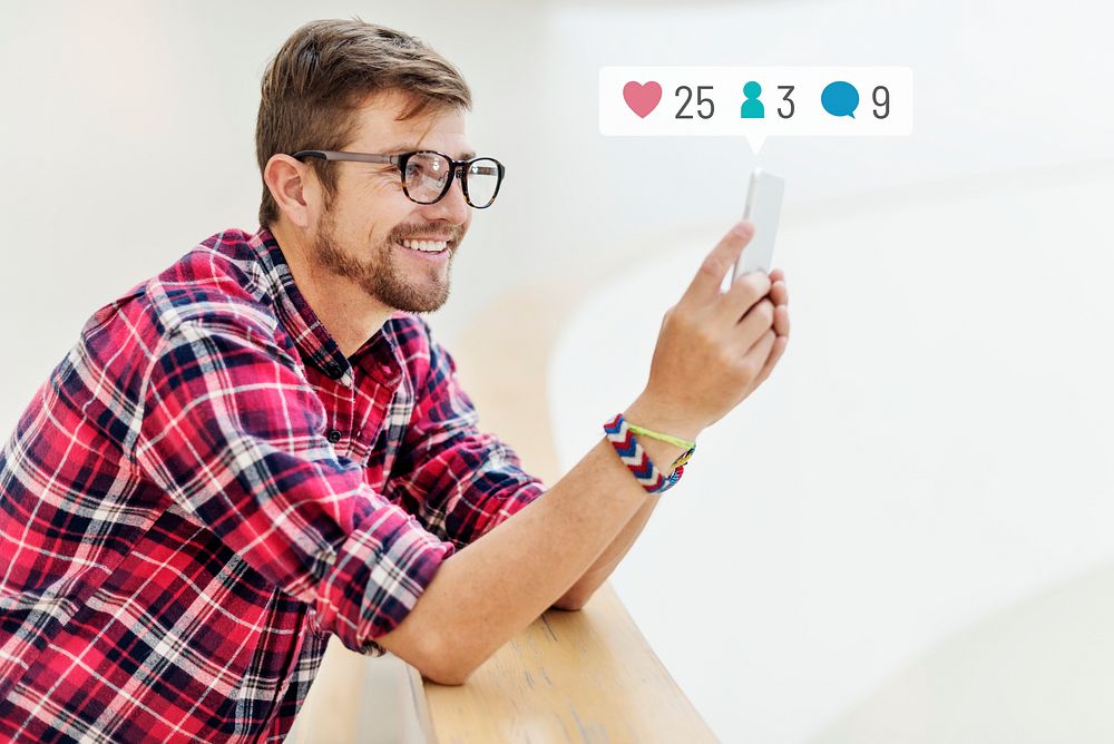 Happy man using social media | Premium Photo - rawpixel