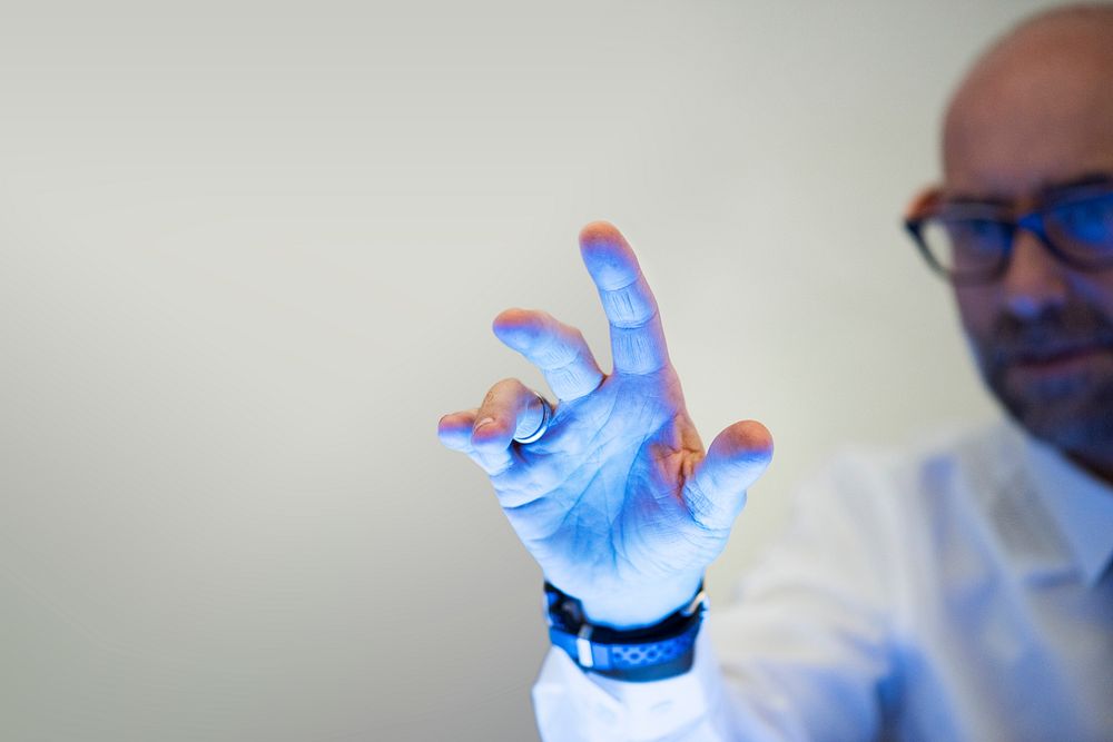Man reaching his hand screen | Premium Photo - rawpixel