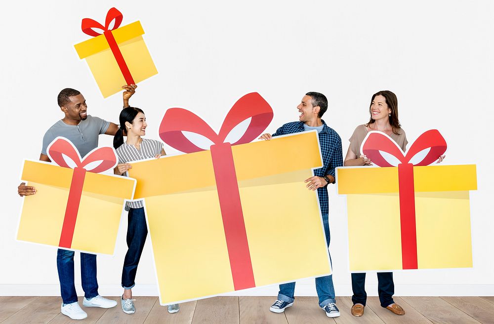 Happy diverse people holding presents | Free Photo - rawpixel