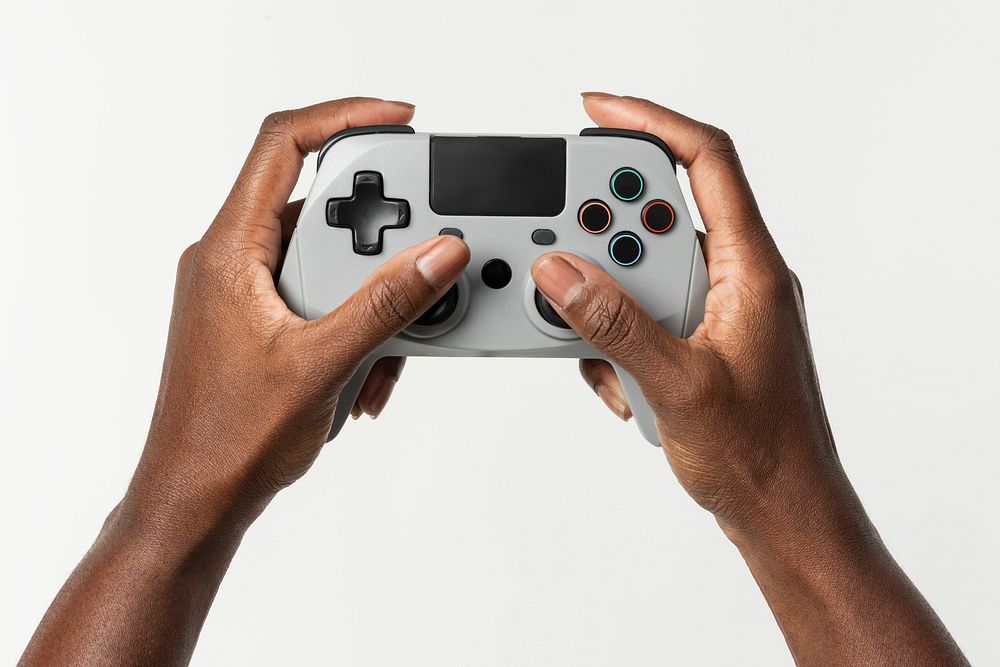 Hands holding video game controller | Premium Photo - rawpixel