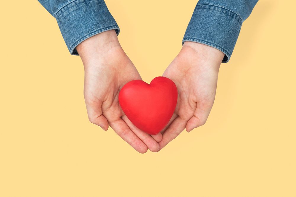 Hands cupping heart mockup psd | Premium PSD - rawpixel