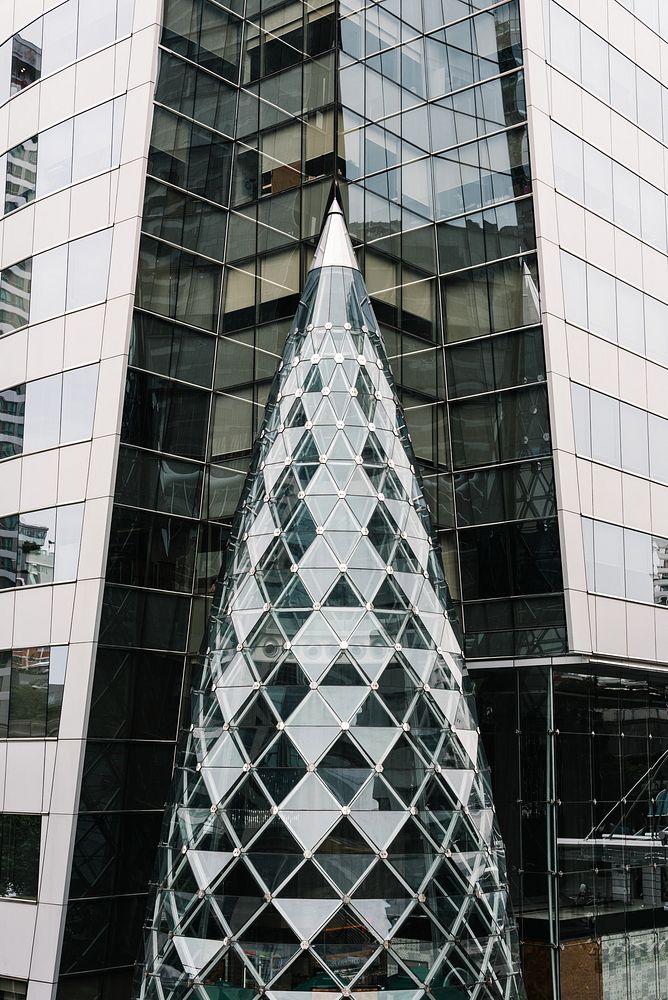Christmas tree construction outside building | Free Photo - rawpixel