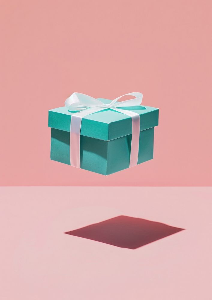 Floating teal gift box | Free Photo - rawpixel