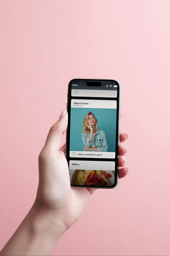 Hand holding smartphone displaying profile | Free Photo - rawpixel