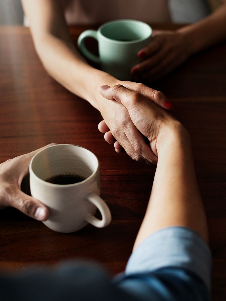 Close-up handshake coffee. Two people | Premium Photo - rawpixel