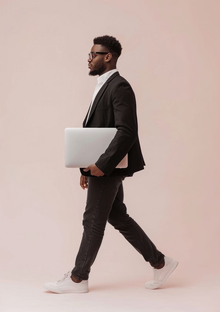 Person holding laptop computer standing | Premium Photo - rawpixel