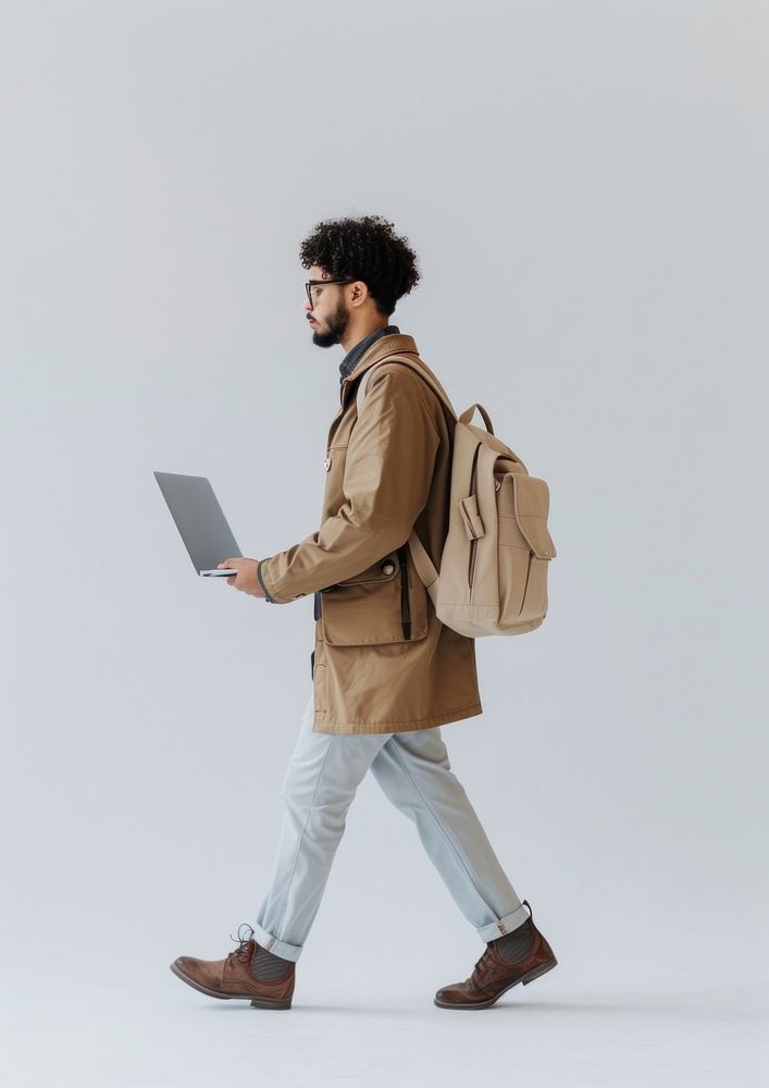 Person holding laptop computer standing | Premium Photo - rawpixel