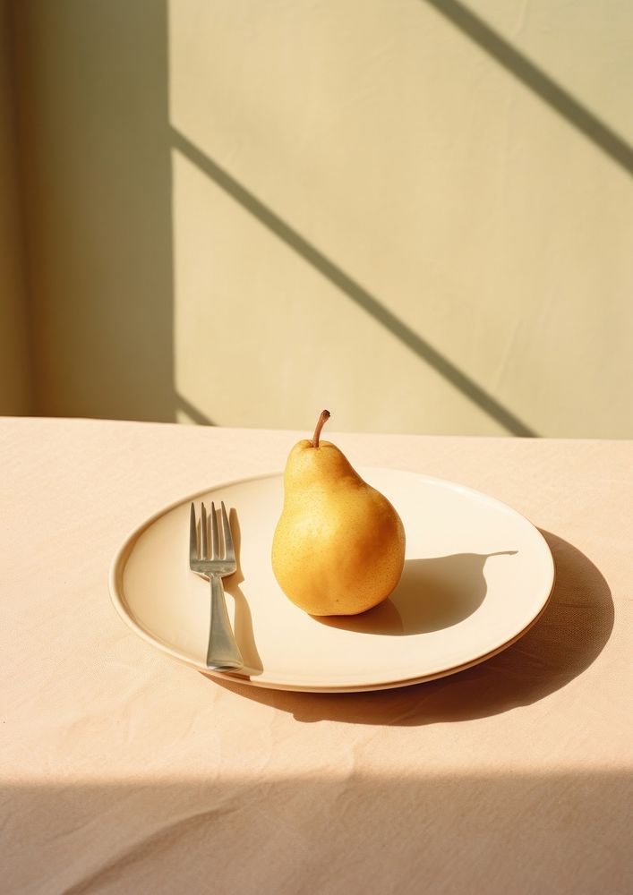 plate fork and pear table | Free Photo - rawpixel