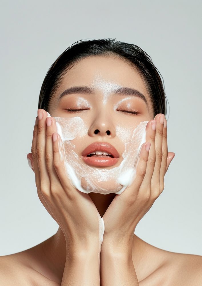 Woman cleansing her face portrait | Premium Photo - rawpixel