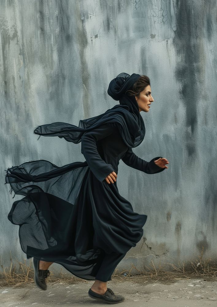 An iranian woman running dancing | Free Photo - rawpixel