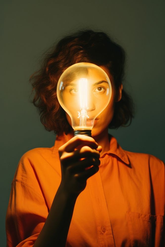 Person holding light bulb lightbulb | Free Photo - rawpixel