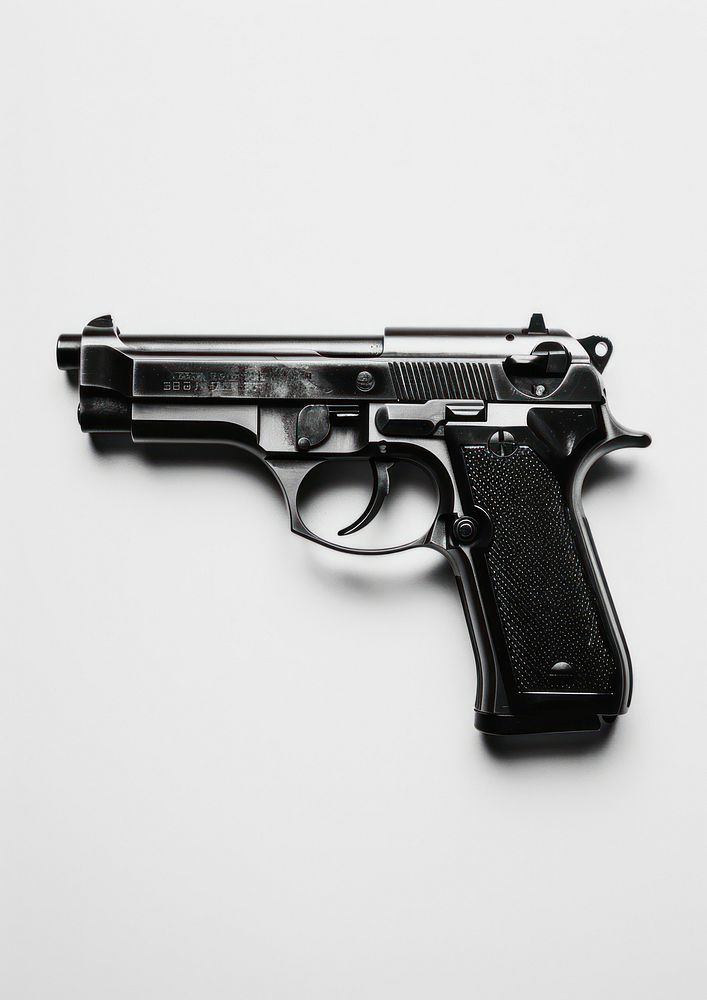 A gun weaponry firearm handgun. | Premium Photo - rawpixel