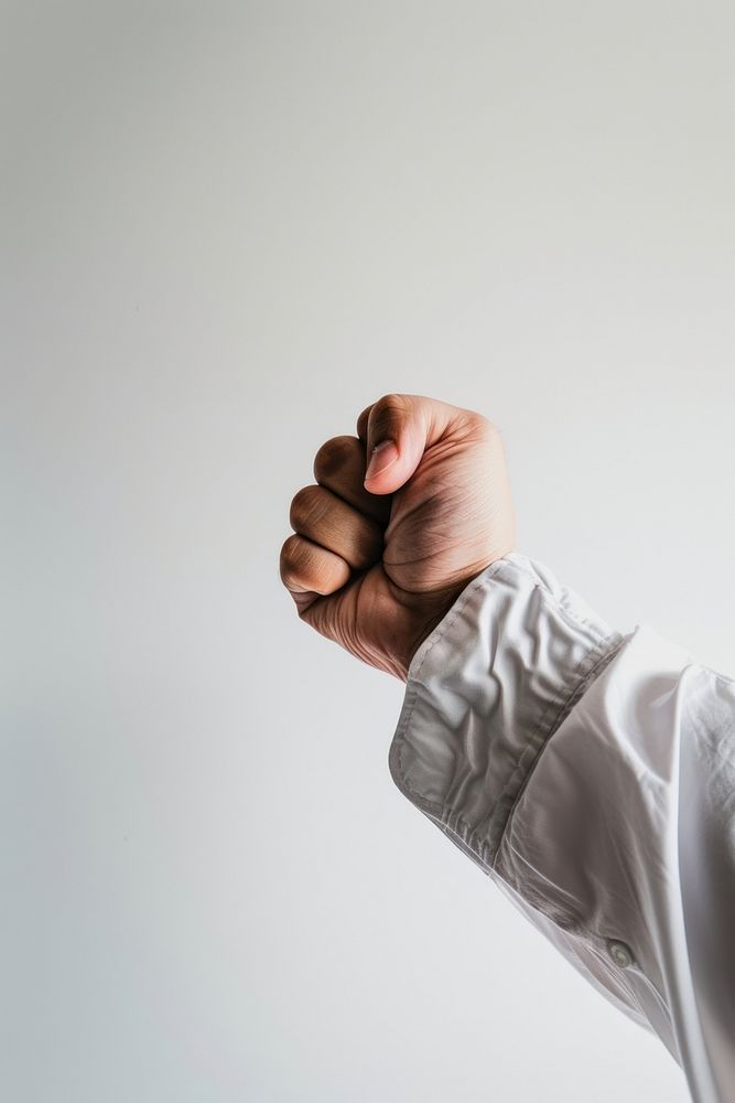 Trowing fist human white hand. | Free Photo - rawpixel