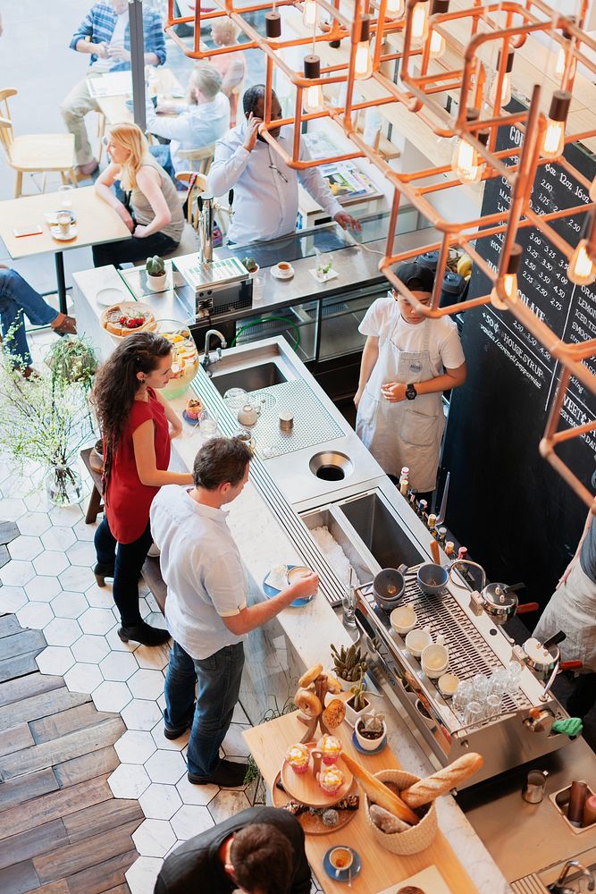 Busy cafe diverse patrons and | Free Photo - rawpixel