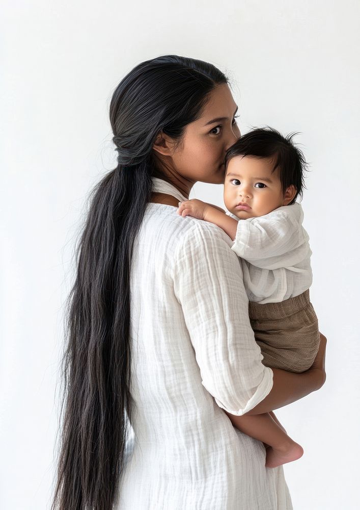 Pacific islander mother holding newborn | Free Photo - rawpixel
