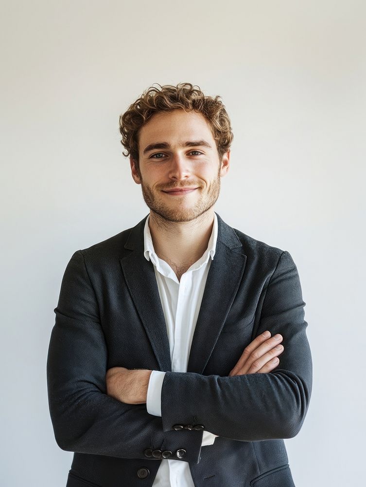 Confident smiling young man portrait | Free Photo - rawpixel