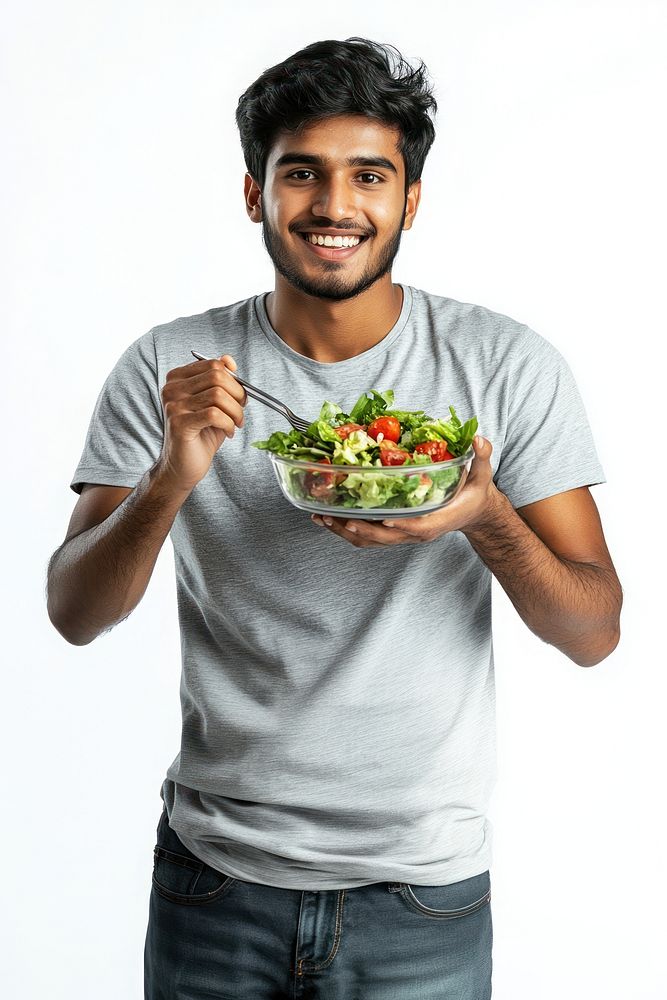 Smiling Indian male model eating | Free Photo - rawpixel